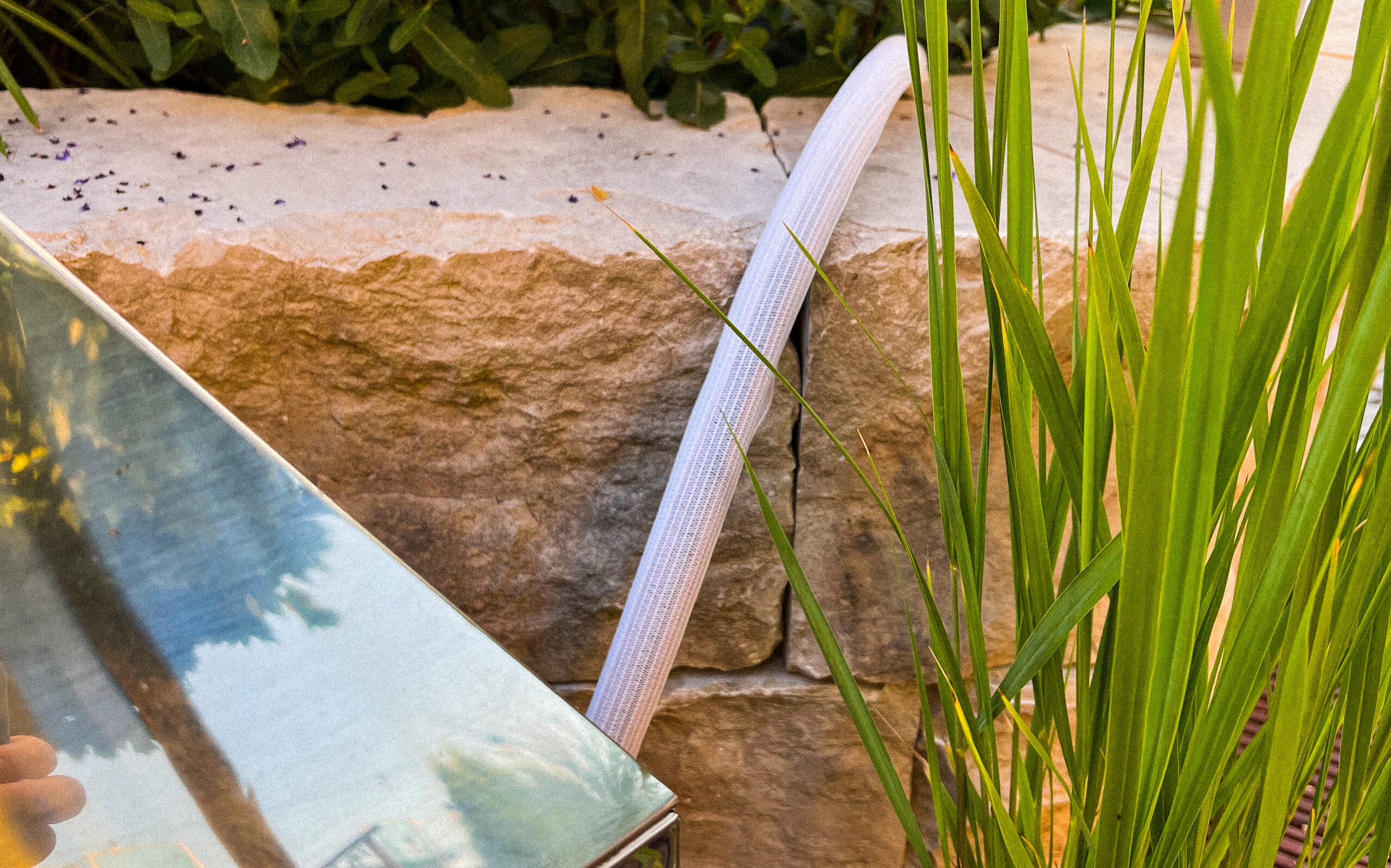Cover visible garden hoses with cable sleeve in white, grey or black ...